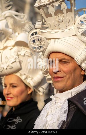Locals and visitors alike dress up in costumes for Venice's famous and ...