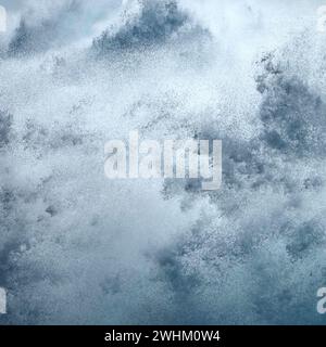 Foaming sea spray Stock Photo - Alamy
