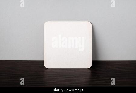 Square beer coaster Stock Photo - Alamy