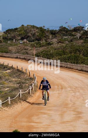 Tourist cycle on Illetes Path Stock Photo - Alamy