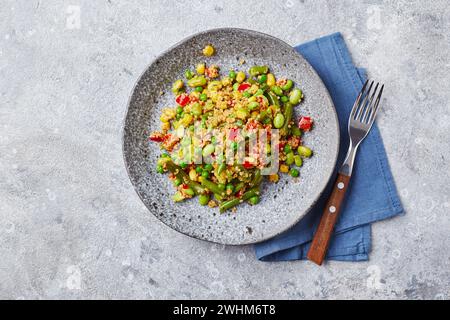 Quinoa salad with green beans, corn, red bell peppers, peas and ...