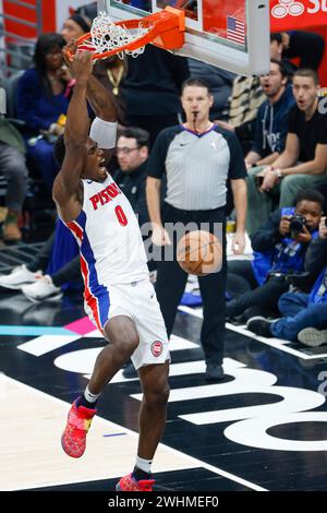 Detroit Pistons' Jalen Duren dunks over Milwaukee Bucks' Kyle Kuzma ...
