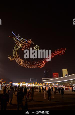 Chengdu, China. 10th Feb, 2024. 3,000 drones are forming a golden ...