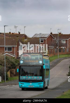 Wellingborough, UK. 10th Feb, 2024. A large poster covers the wall ...