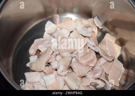fried pork skin in a pot Stock Photo - Alamy