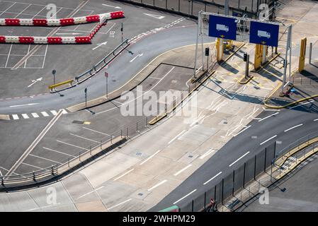 Road marking directional signs for cargo in a harbor. Public ...