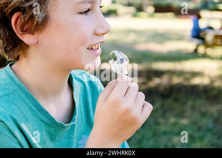 Child with orthodontic appliance to correct malocclusion, forward bite ...