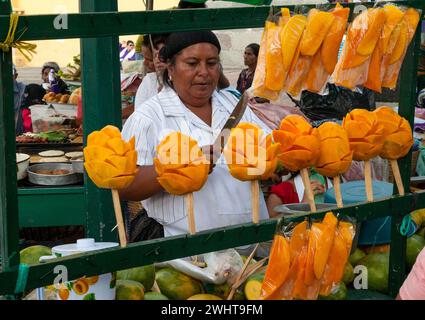 Antigua, Guatemala. Vendor Selling Fresh Mangoes on a Stick Stock Photo ...