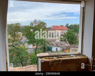 Destroyed and burned houses in the city Russia Ukraine war Stock Photo ...