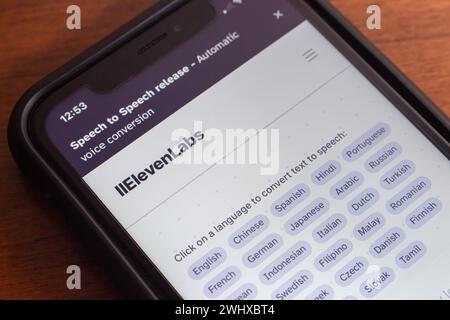 ElevenLabs website seen in iPhone. ElevenLabs is tech company that specializes in developing ...