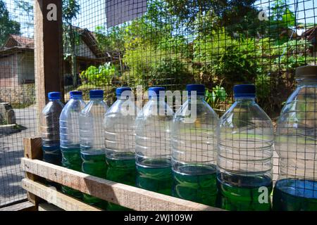 Gasoline sold in retail uses liter bottles Stock Photo - Alamy