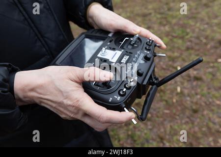 LVIV, UKRAINE - Feb. 11, 2024: A young man is seen controlling the ...