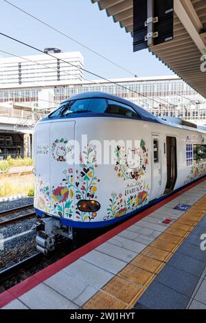 Hello Kitty, in a Japan Rail train conductor uniform, aboard the ...