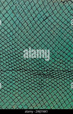 Green mesh, rhombus grid on blue background Stock Photo - Alamy