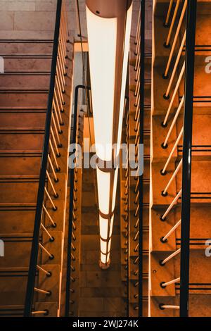 Rectangular staircase with light column, view from above, vertical ...