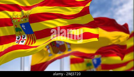 Aragon flag and Spanish flag waving in the wind. Aragon is an ...