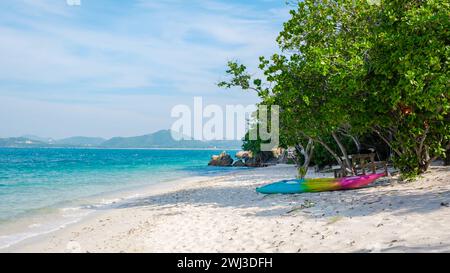 A colorful kayak on the beach of Ko Kham Island Sattahip Chonburi ...