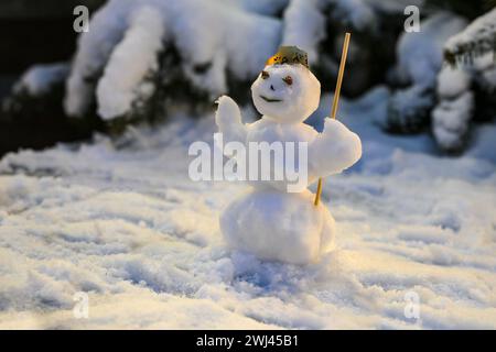 Cute snowman and little Christmas trees made of marshmallows on the ...