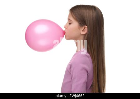 Girl inflating pink balloon on white background Stock Photo - Alamy
