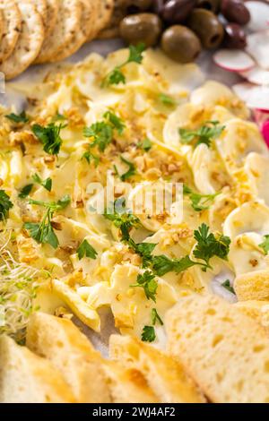 Butter board with vegetables and bread Stock Photo - Alamy