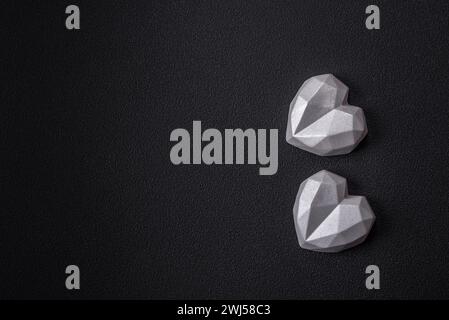 Beautiful tasty sweet candies in gray color on a dark concrete ...