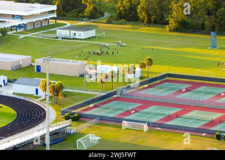 Public school open air tennis court with new stadiums in rural Florida ...