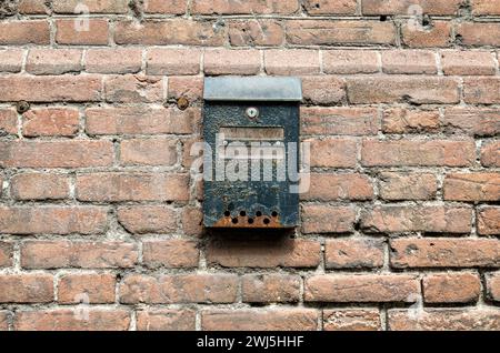 old metal rusty letterbox with number five Stock Photo - Alamy