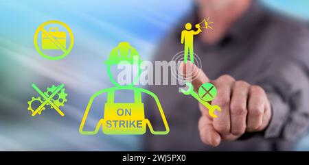 Man touching a strike concept on a touch screen with his finger Stock ...