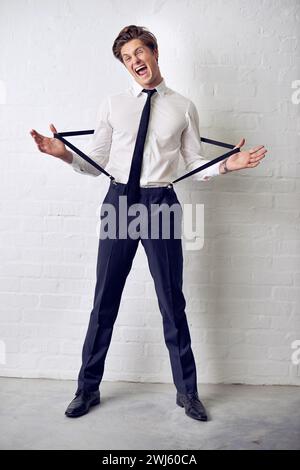 Crazy guy in funny clothes shoots himself on an old video camera Stock ...