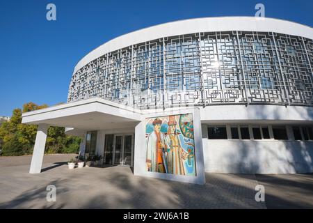 Exterior view of the circular, round Soviet era Socialist, Modernist ...