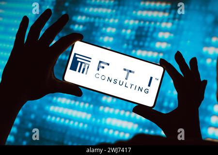 In this photo illustration, the FTI Consulting company logo is seen ...