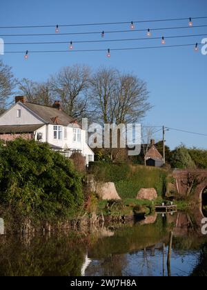 Bird flight diverters visibility markers hanging on power lines running ...