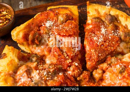 Homemade Mini Chicago Style Deep Dish Pizza with Sausage Stock Photo ...