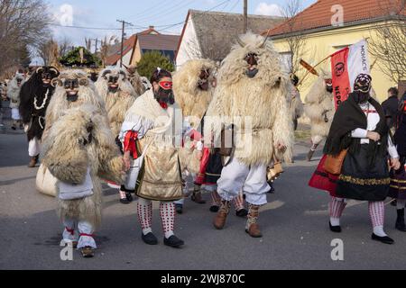 Mohacs, Hungary. 13th Feb, 2024. Busos, costumed people wearing wooden ...