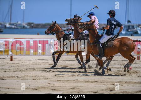 Polo players from Captain Baxter and Whispering Angel team are seen in ...