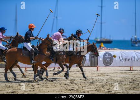 Polo players from Captain Baxter and Whispering Angel team are seen in ...