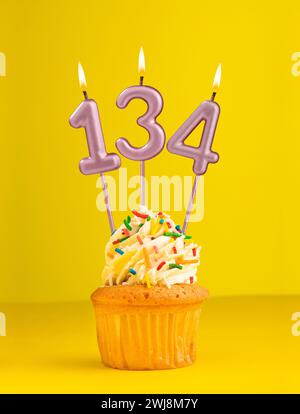 Number 134 candle - Birthday card design in orange background Stock ...