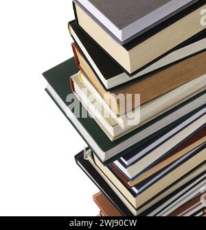 Stacked old books of different shape and color. Isolated on white ...