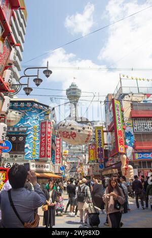 Shinseikai Food Street Signs in front of Tsutenkaku Tower, Osaka, Japan ...