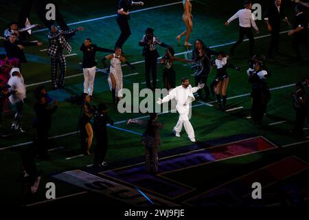 Usher performs during halftime of the NFL Super Bowl 58 football game ...