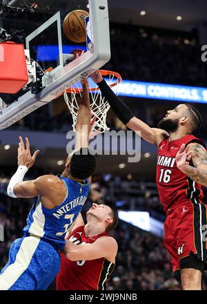 Miami Heat forward Caleb Martin (16) scores during the second half of ...