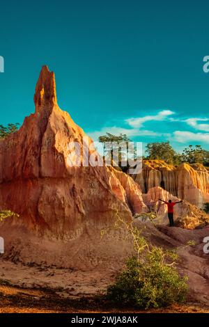 Tourists dwarfed by rock formations at Marafa Depression - Hell's ...