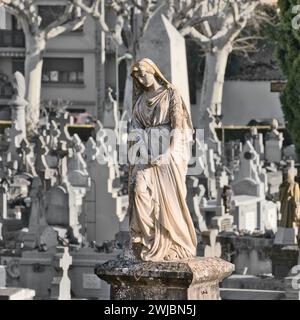 French cemetery, Jesus Christ on the cross Stock Photo - Alamy