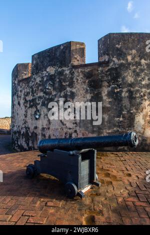 A colonial Spanish cannon on a wooden gun carriage at Fortaleza San ...