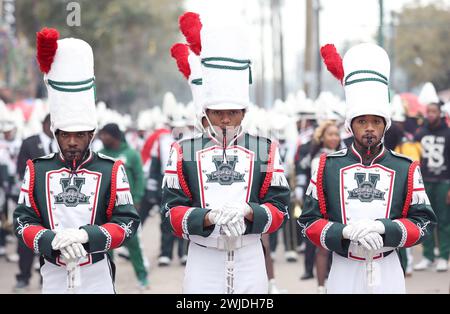 New Orleans, USA. 13th Feb, 2024. The Warren Easton Marching Band ...