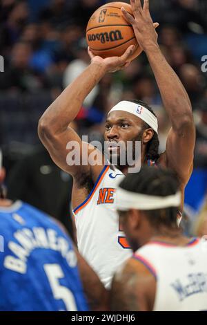 New York Knicks' Precious Achiuwa (5) and Cameron Payne (1) defend ...