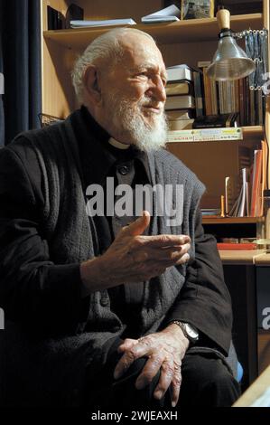 French catholic priest Abbe Pierre poses at home in Alfortville, near ...