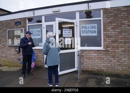 People arrive at Irchester Village Hall, as voting gets underway in the ...