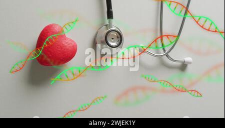 Image of dna strands over heart and stethoscope on blue background ...