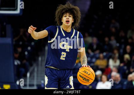 Georgia Tech guard Naithan George (1) chases a ball against Louisville ...